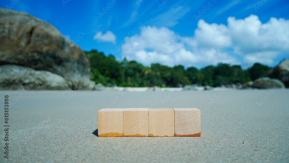 Mockup wooden cubes on on the beach sand. Free space wooden cubes for ...