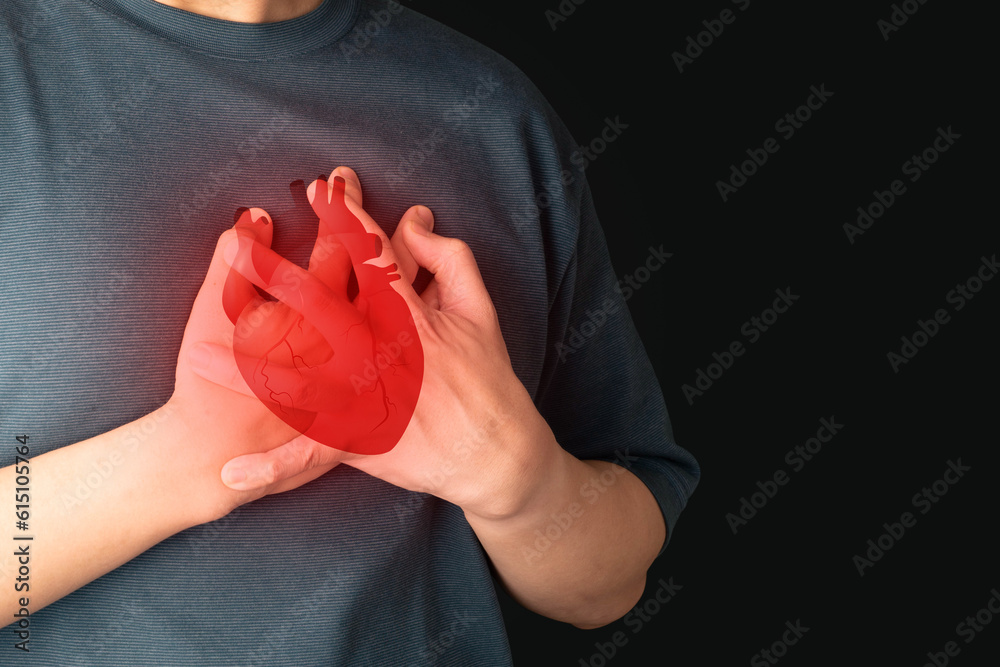 Man suffering from chest pain, having heart attack with heart organ ...