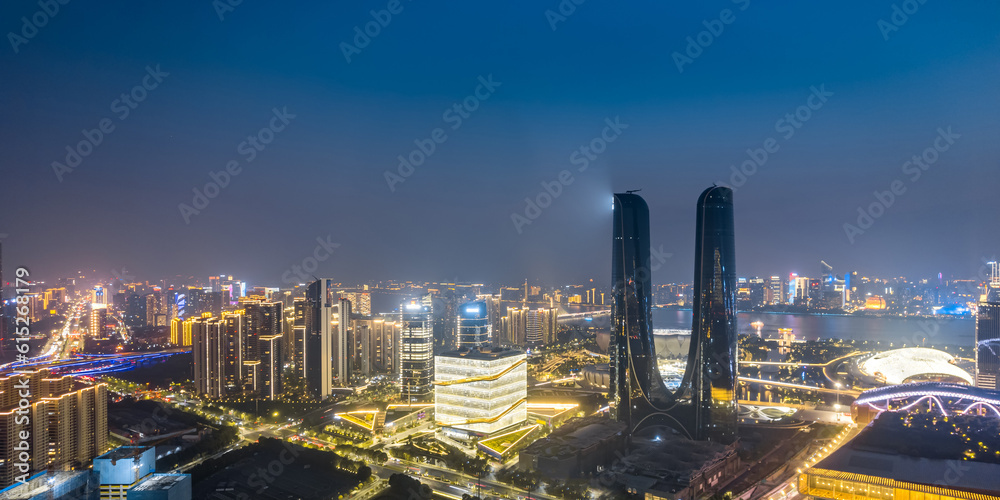 Aerial photography of night view of Hangzhou Gate, Hangzhou Century ...