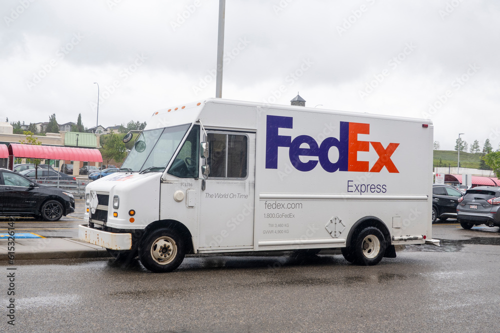 Calgary, Alberta, Canada. Jun 20, 2023. A side view of a Fedex delivery ...