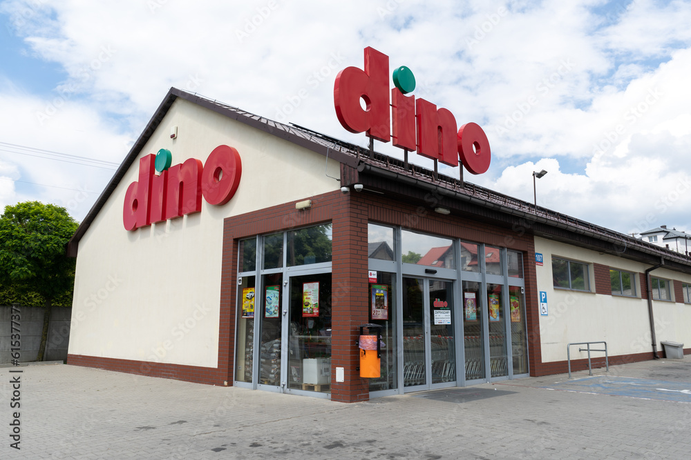 Foto de Dino supermarket shop with logo sign. Polish retail chain ...