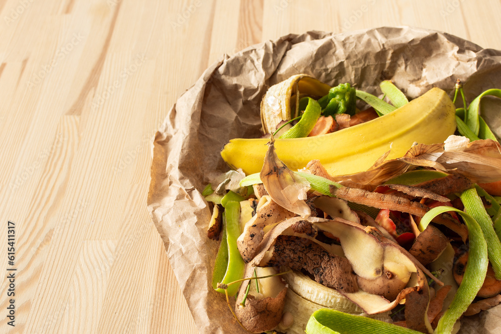 Food organic waste on eco friendly parchment paper, fruit and vegetable ...