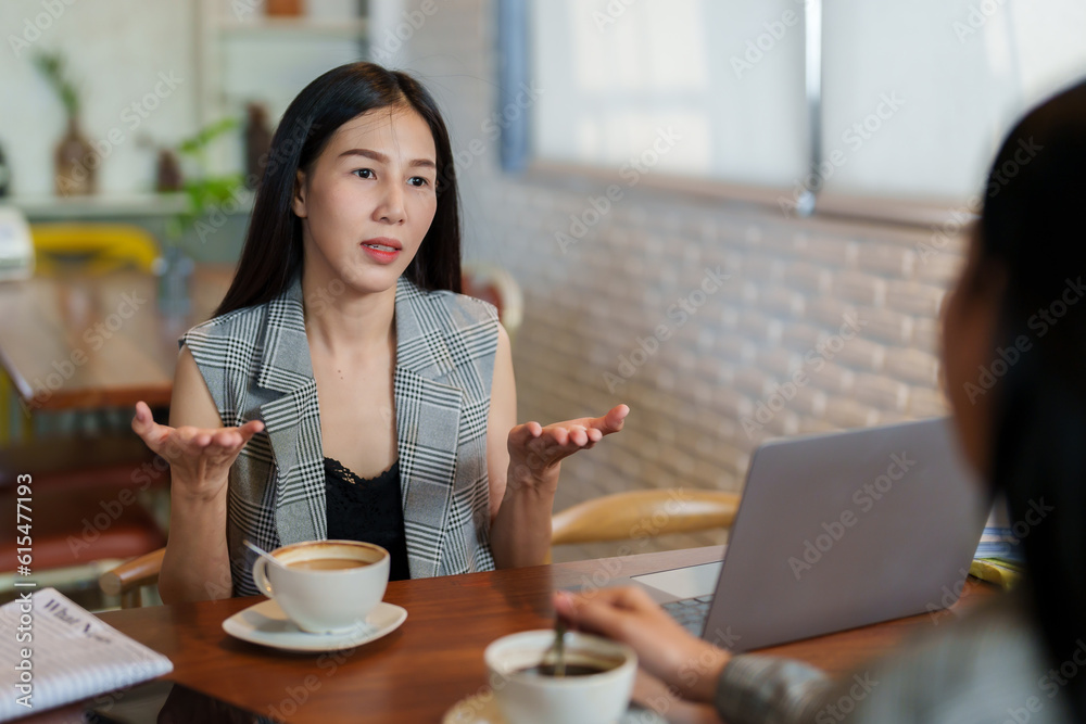 Supervisor, beautiful long-haired Asian woman sitting Discuss stress ...