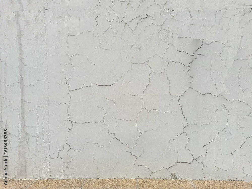Cracks formed on the cement wall. Cracks in the cement floor until a ...
