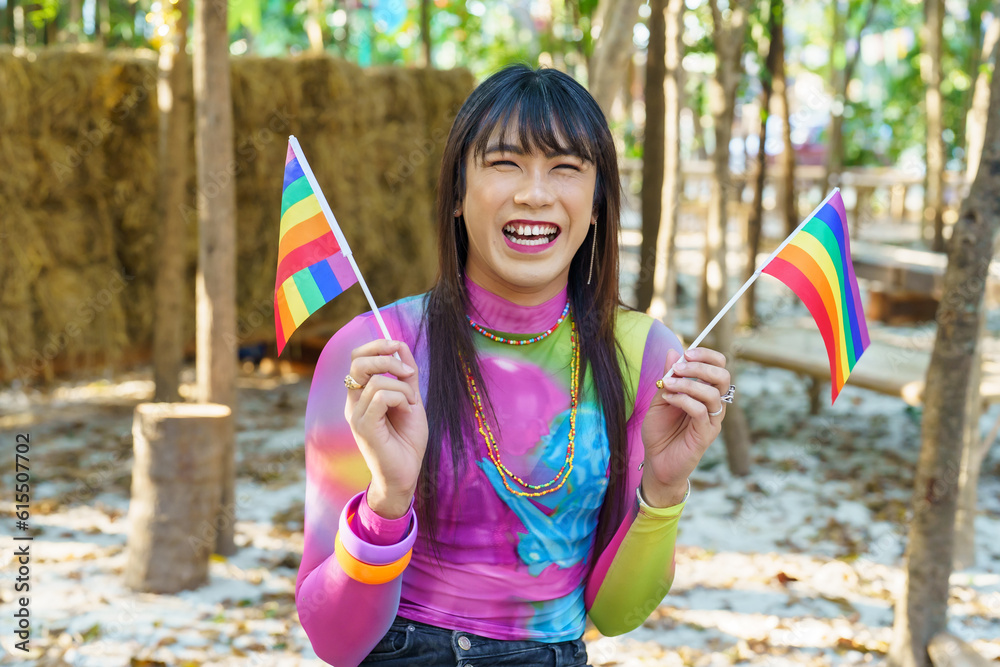 Gender Spectrum smiling happy Thai transgender Asian woman with rainbow flag Stock Photo | Adobe ...