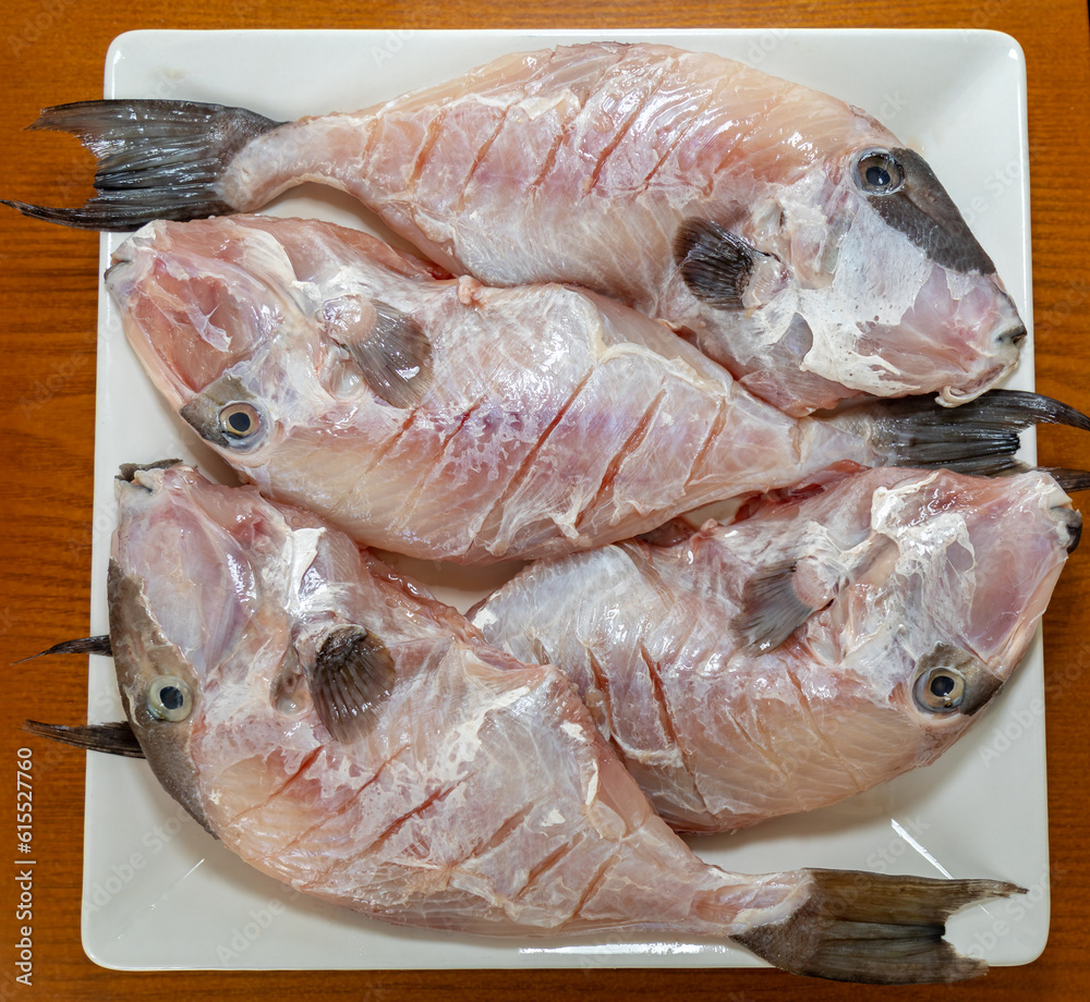 Clean and seasoned Peroá fish (Balistes capriscus) . Typical fish from ...