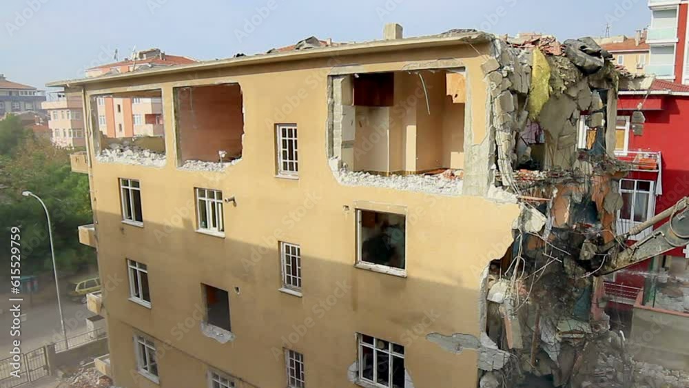 Demolition of building with concrete floors and pillars on construction ...