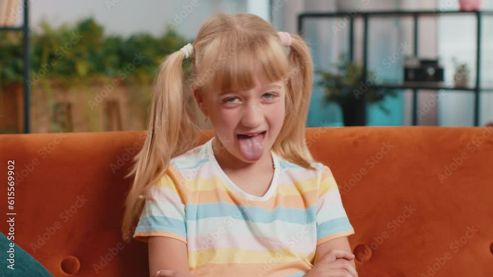 Caucasian joyful preteen school girl making playful silly facial ...