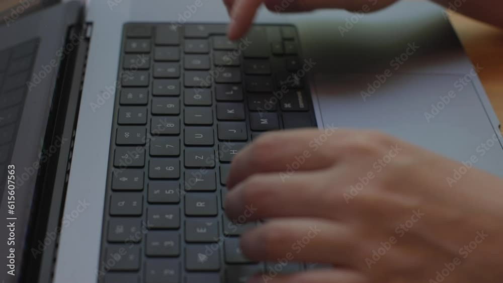 female hands close-up typing black laptop keyboard. typing computer ...