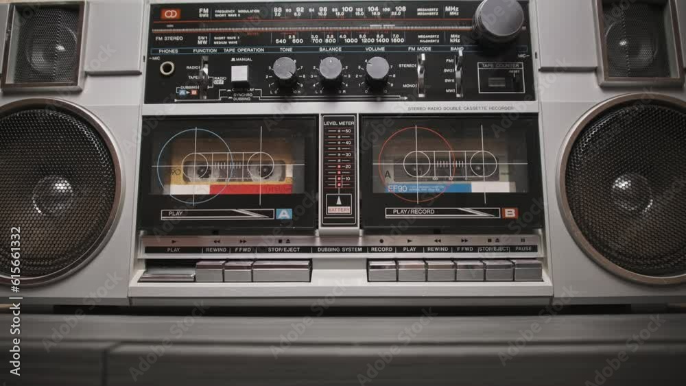 Music from a vintage boombox player. Analog sound from an old audio ...