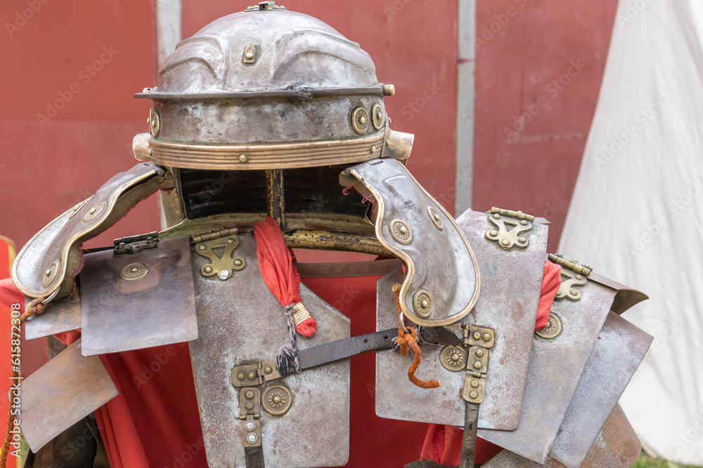 foreground of helmet and armor of an ancient roman empire soldier ...