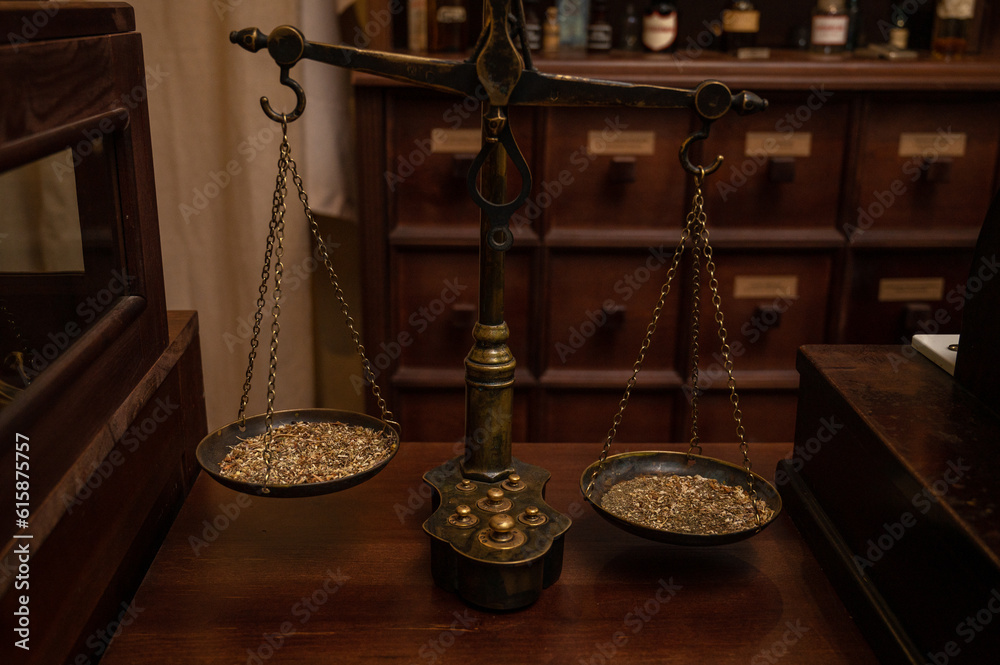 Old classic weight scale on the table of retro pharmacy from the 19th ...