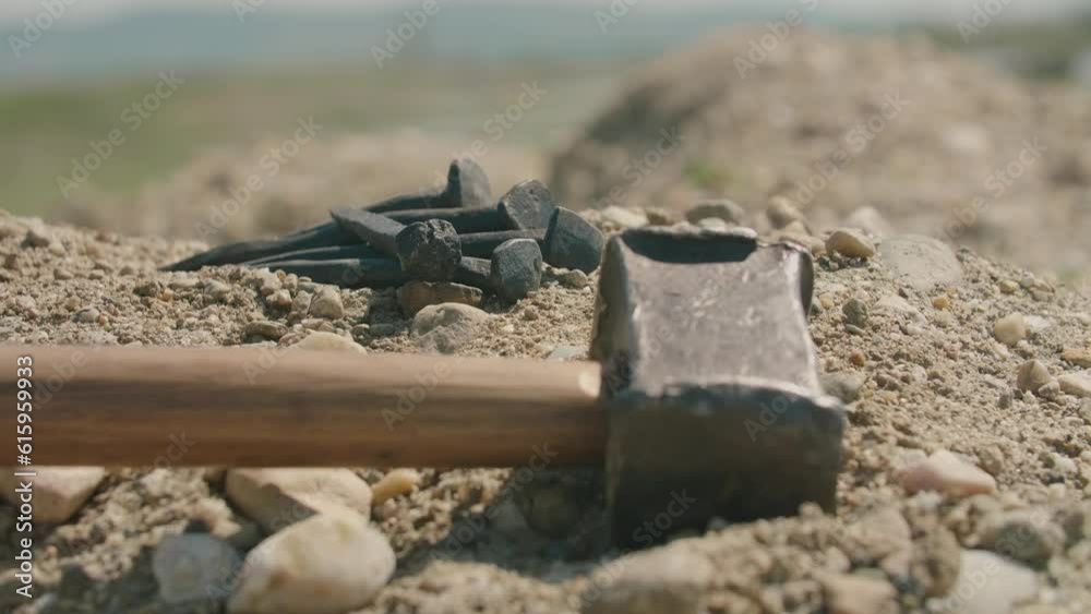 Soldier taking a hammer and nails for the crucifixion of Jesus. Dolly ...
