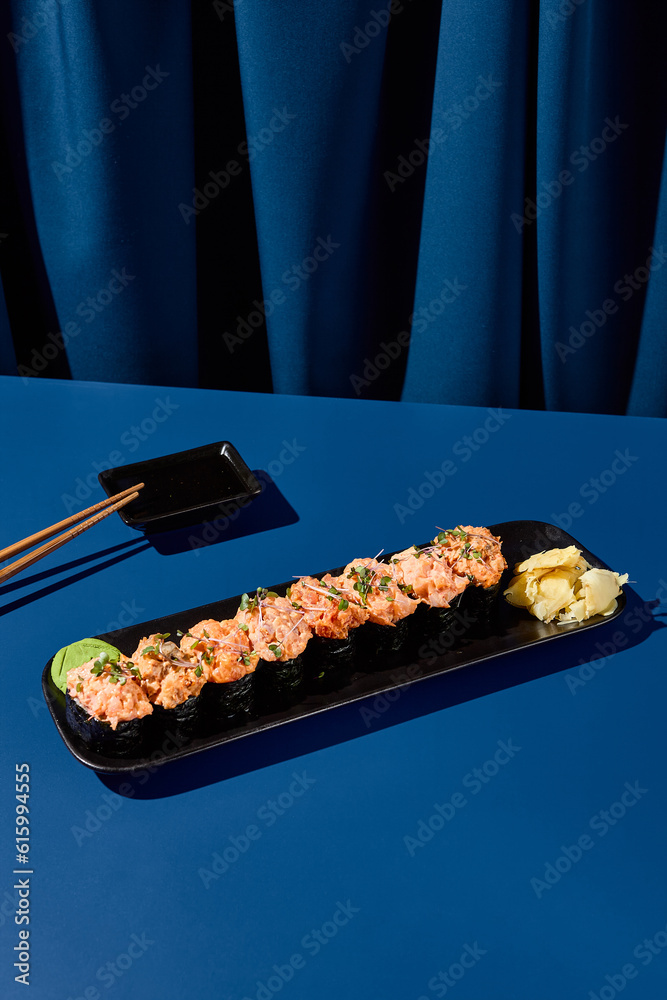 Gunkan sushi set with crab, shrimp, salmon, tuna, and eel, presented on ...