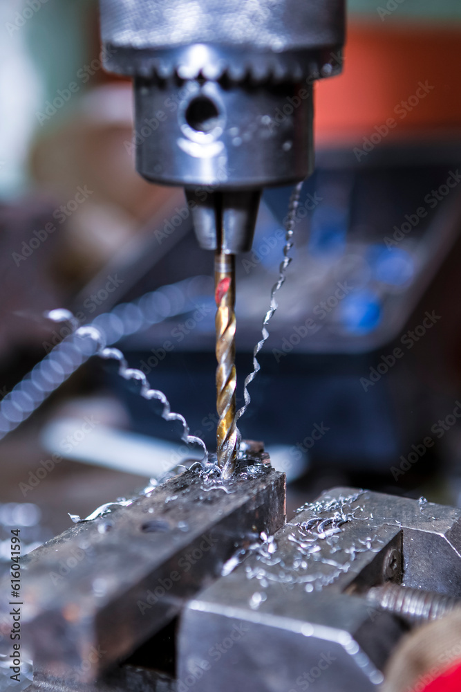 Foto de Fitter Man Using Metal Drilling Machine for Making Holes In ...