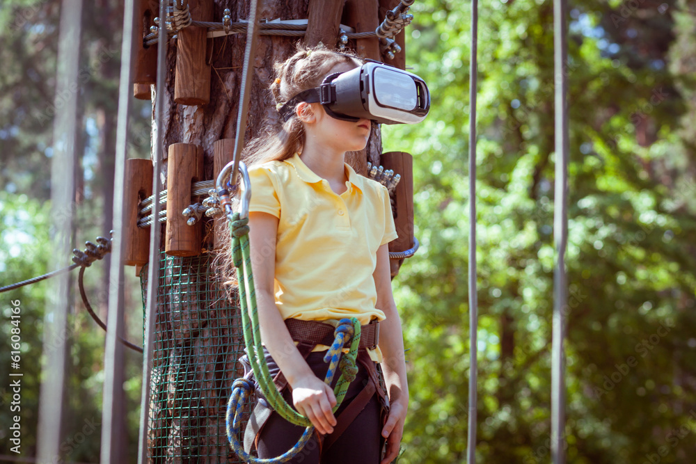 The girl plays a virtual game, she goes in for sports virtually ...