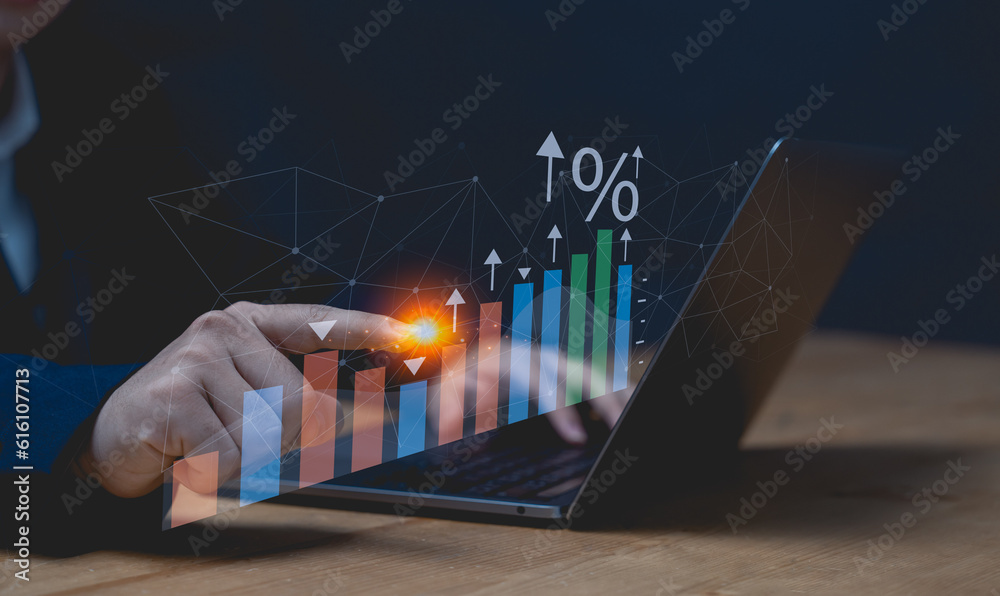 Businessman is calculating income and return on investment in ...
