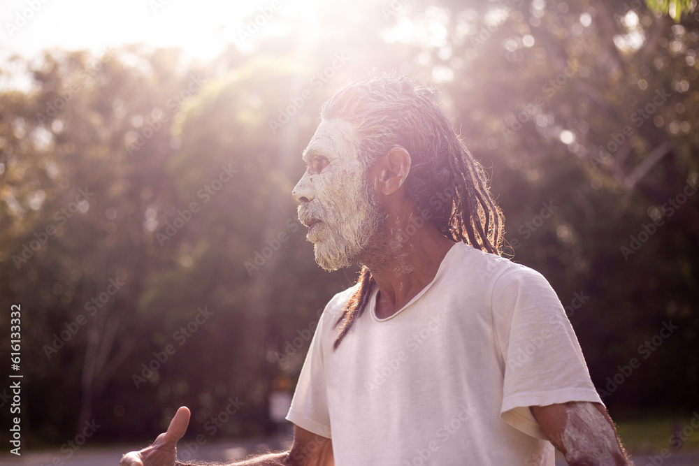 Side profile portrait of aboriginal man with sun flare Stock Photo ...