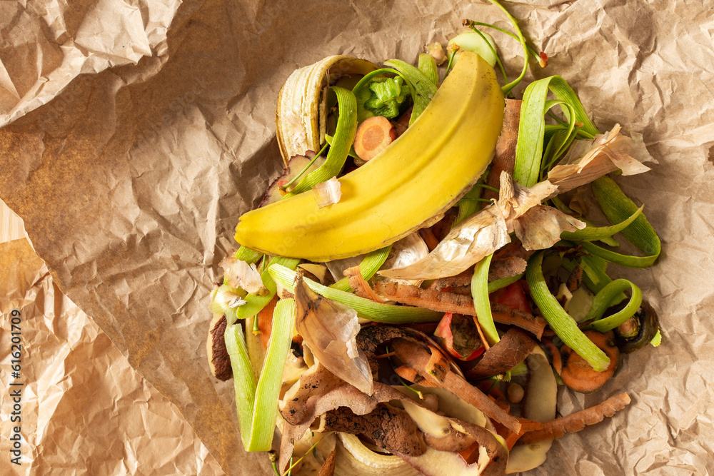 Food organic waste on eco friendly parchment paper, fruit and vegetable ...
