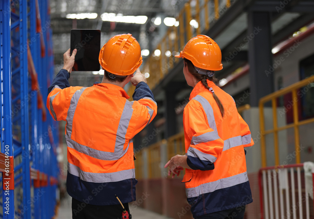 Back view two professional workers with work for stock condition in ...