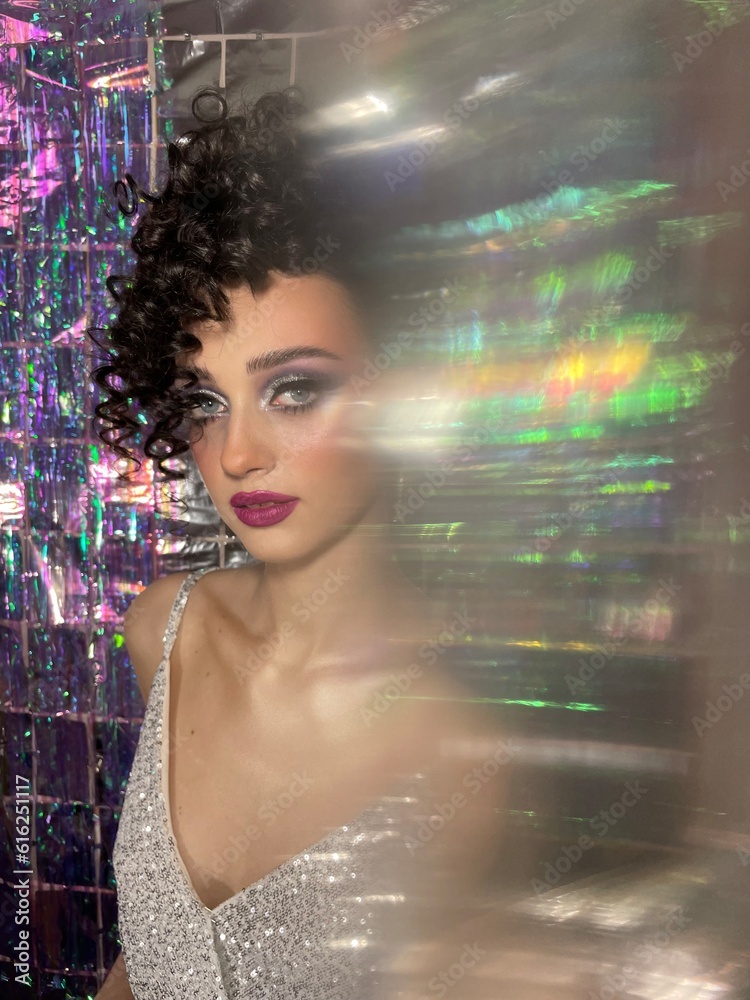 Portrait of a girl with disco makeup in the style of 70s music with a ...
