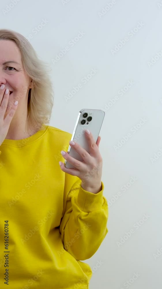 surprise embarrassment shame woman in orange yellow sweater stands in ...