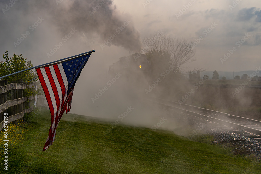 Foto de A Steam Locomotive Backing Up Blowing Lots of Smoke With a ...