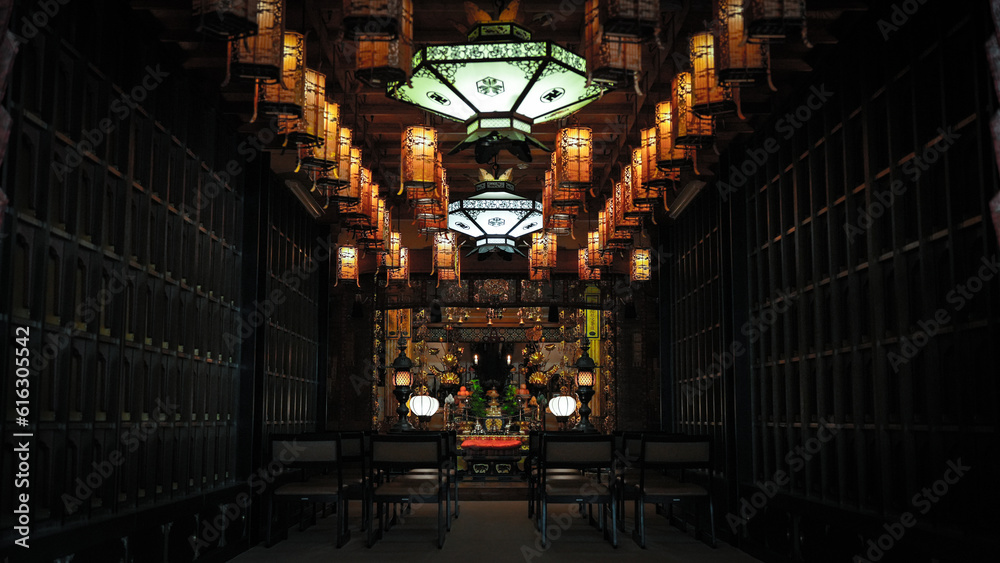 Inside a Japanese temple. In the back, you can see the figure of Buddha ...