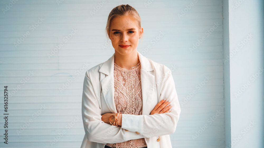 Attractive young woman profile portrait in office . Confident business ...