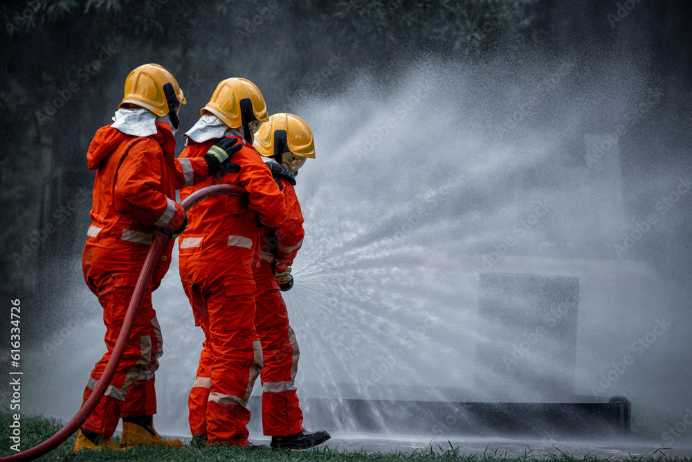 Firefighters safety using twirl water fog type fire extinguisher to ...