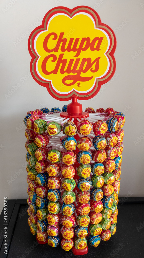 Chupa Chups logo text and Spanish brand sign on candy lollipop display ...