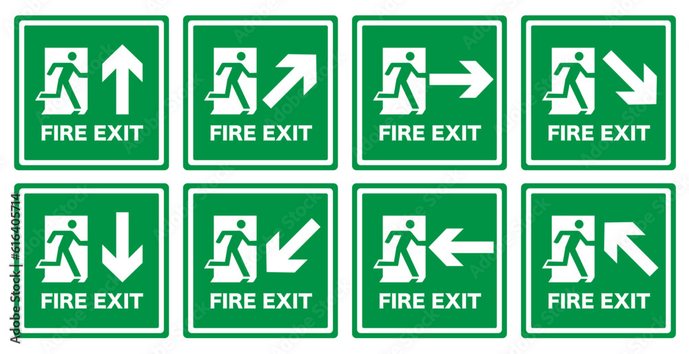 Round stickers indicating the direction of the fire exit. Emergency ...