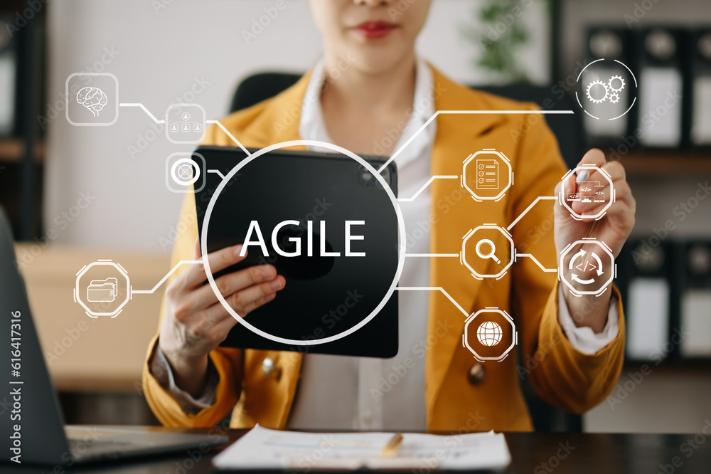 Agile development methodology concept. Business hand using laptop ...