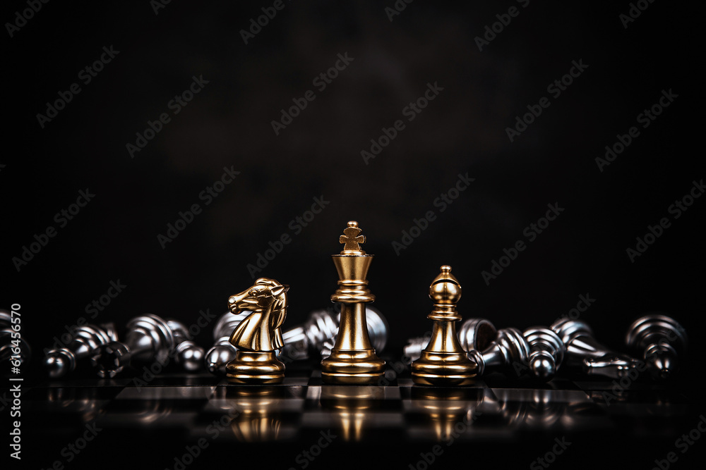 King chess pieces stand win with teamwork on falling chess concept of ...