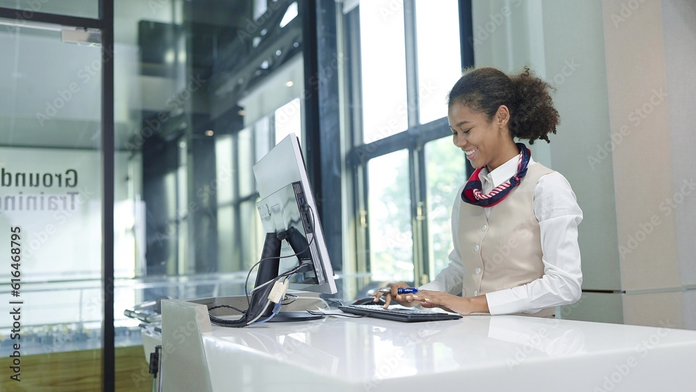Young american african women airline ground staff worker in uniform ...