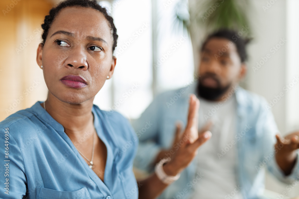 Displeased black couple arguing during lunch at dining table Stock ...