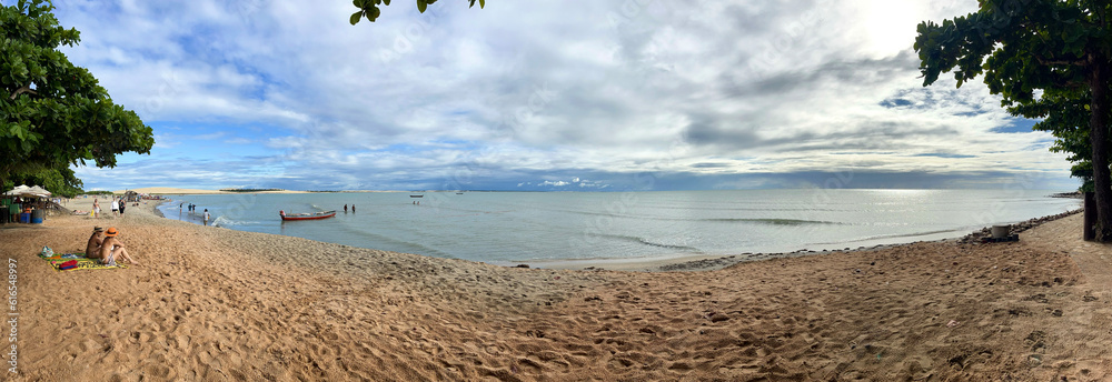 Brazil: people relaxing, sunbathing and swimming on Praia Principal de ...
