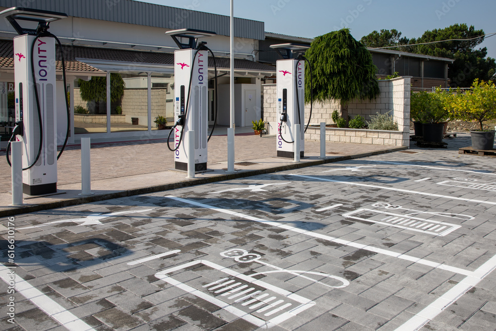 Ionity electric car line fast charging station logo brand and text sign ...