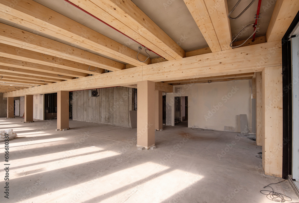 construction site of a sustainable Timber-concrete composite office ...