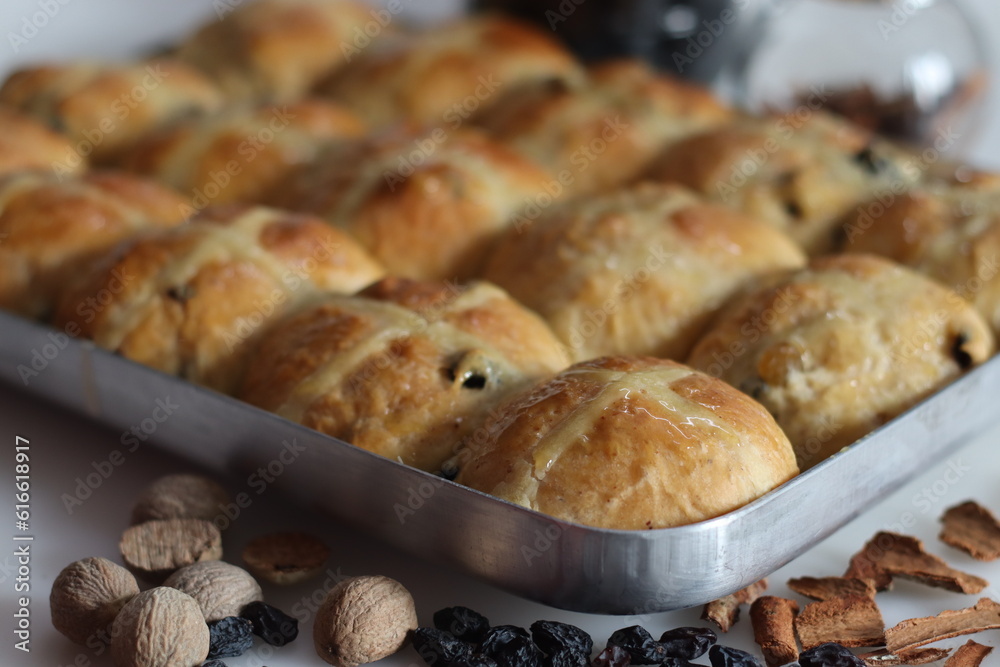 Hot cross buns. A sweet fruit bun lightly spiced with cinnamon and ...