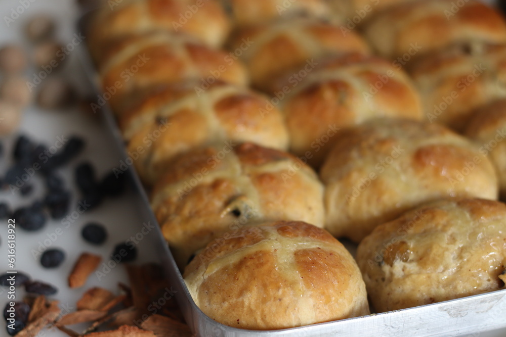 Hot cross buns. A sweet fruit bun lightly spiced with cinnamon and ...