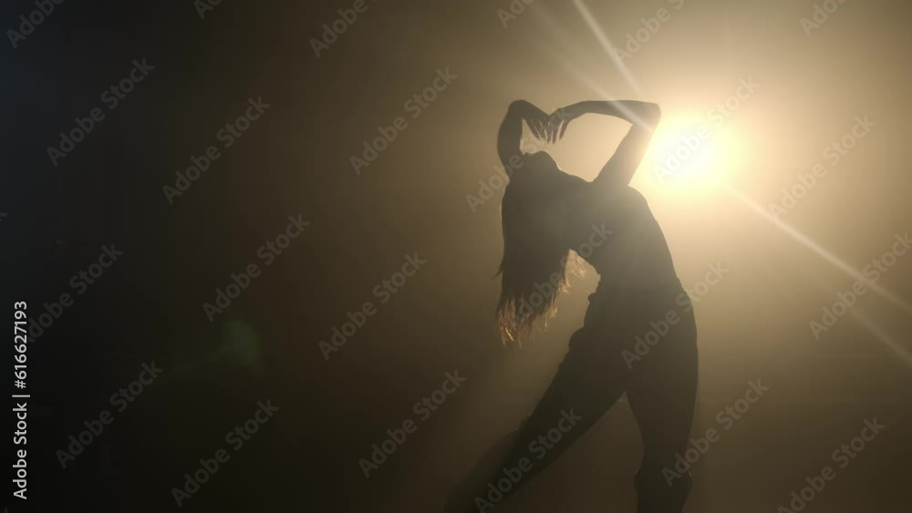Beautiful dancing background slow motion, ART 4K concept. Silhouette of ...