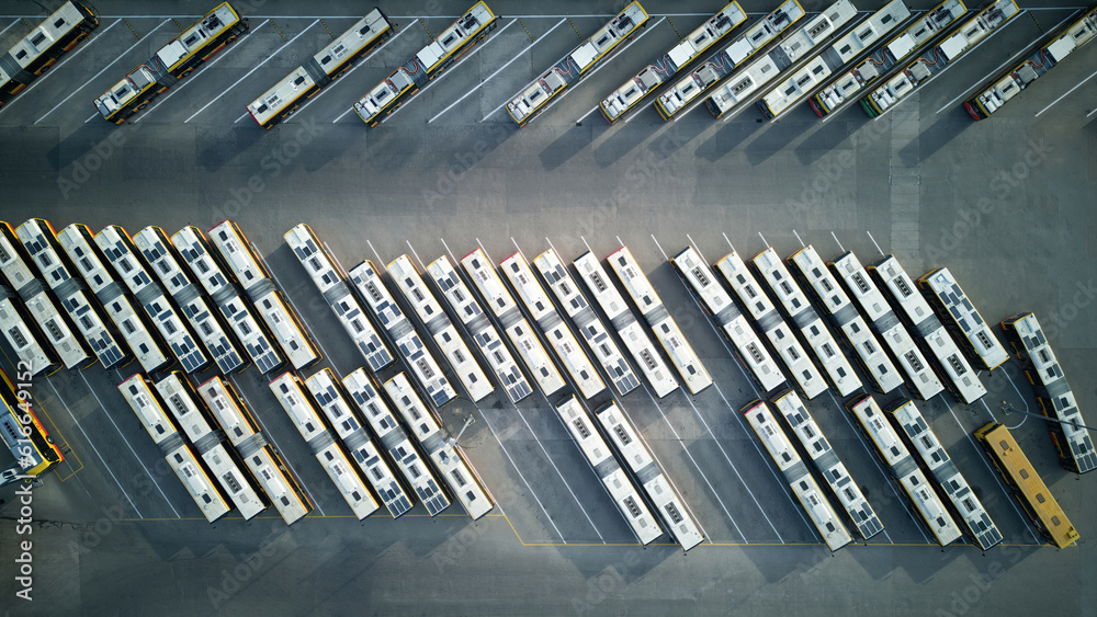 Aerial top down shot of bus terminus, designated place where bus or ...