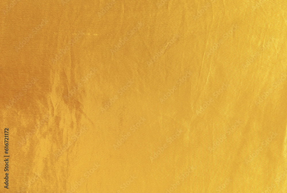 Gold silk texture background. Yellow shiny gold fabric sheet surface ...