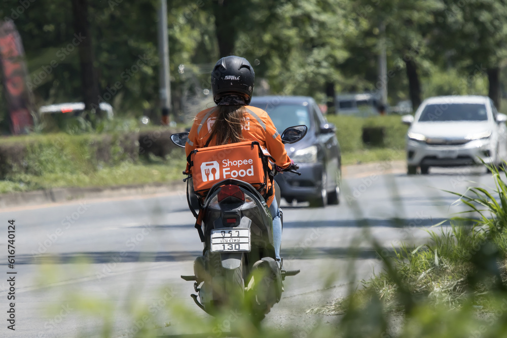 Delivery service man ride a Motercycle of Shopee Food Stock Photo ...