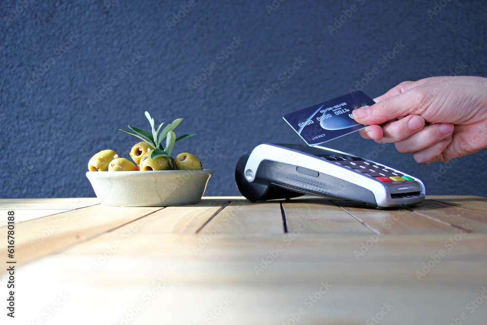contactless payment card pdq background copy space with hand holding ...