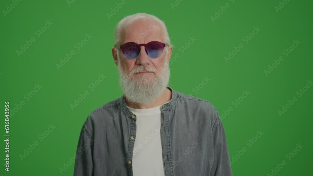 Green Screen. An Angry Old Man in the Funny Glasses Shows a Stop Sign ...