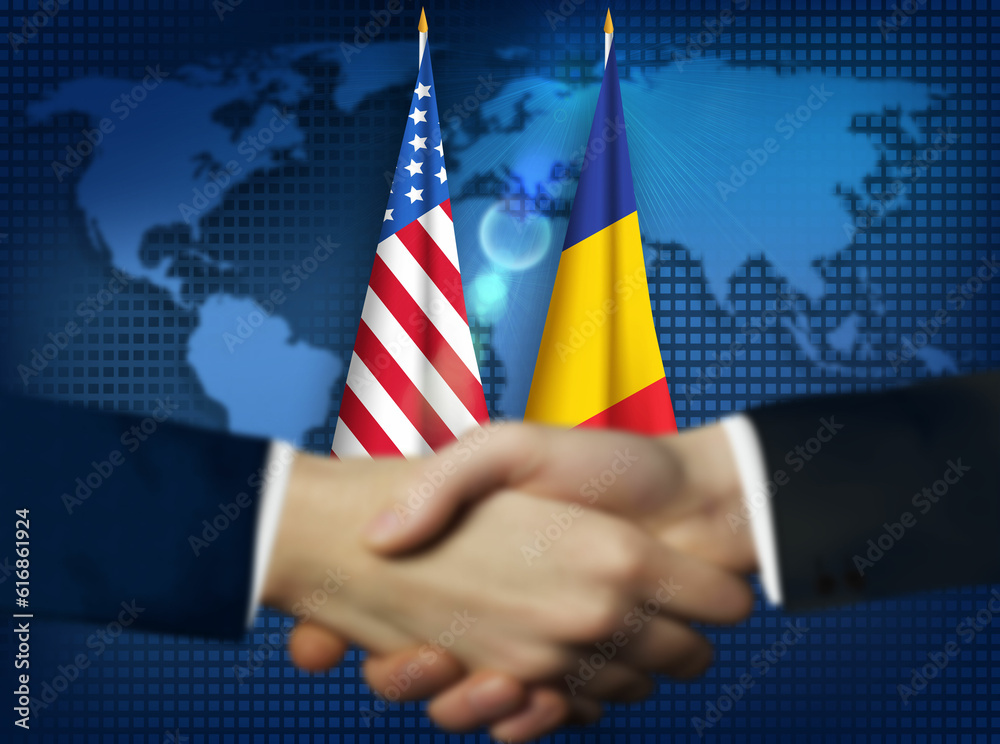 Two person shaking hands in front American,Chad flags.Chad,US bilateral ...