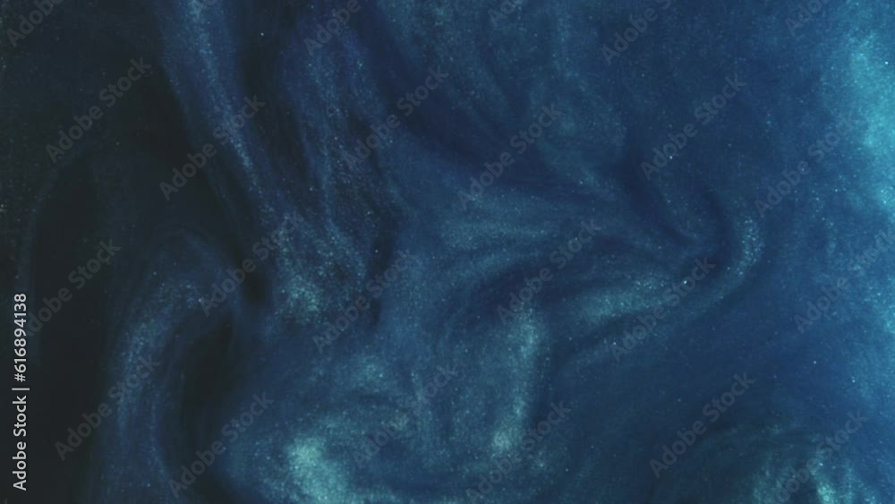 Glitter fluid. Paint water. Ink splash. Sea storm. Blue color glowing ...