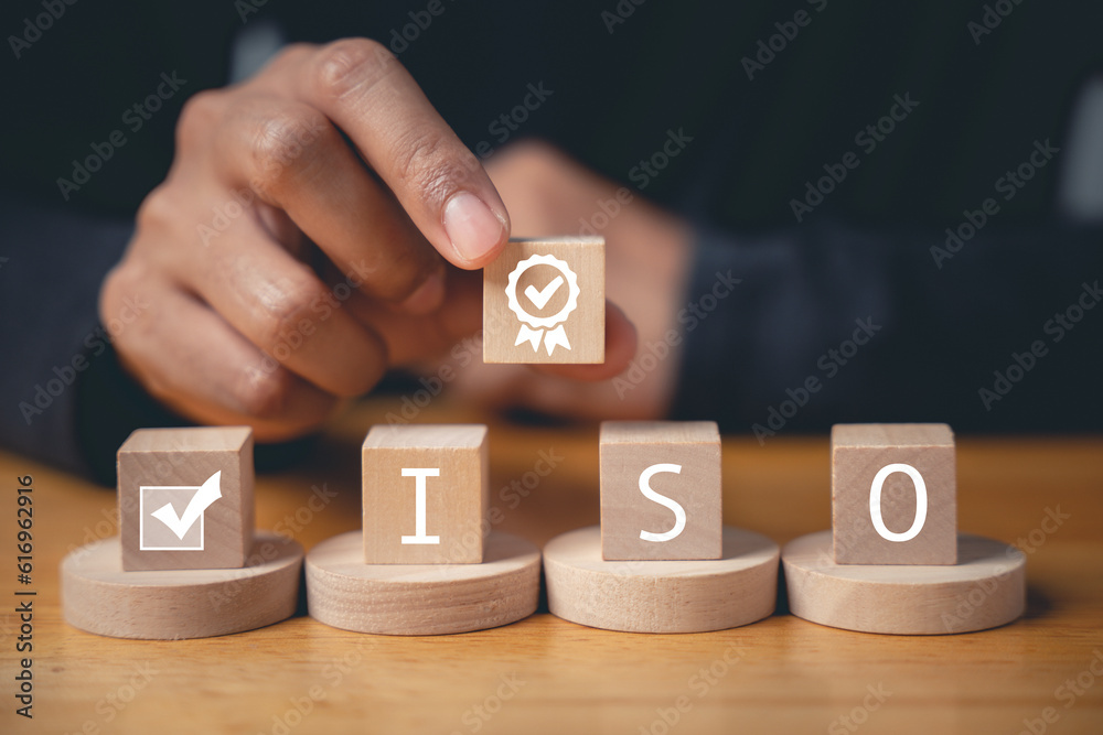 Wooden cube with a guarantee icon and smart globe ISO icons ...